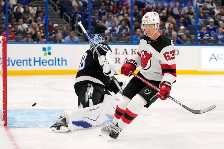 Connor Brown scores 2 goals as Devils beat Lightning 5-3 for 1st win