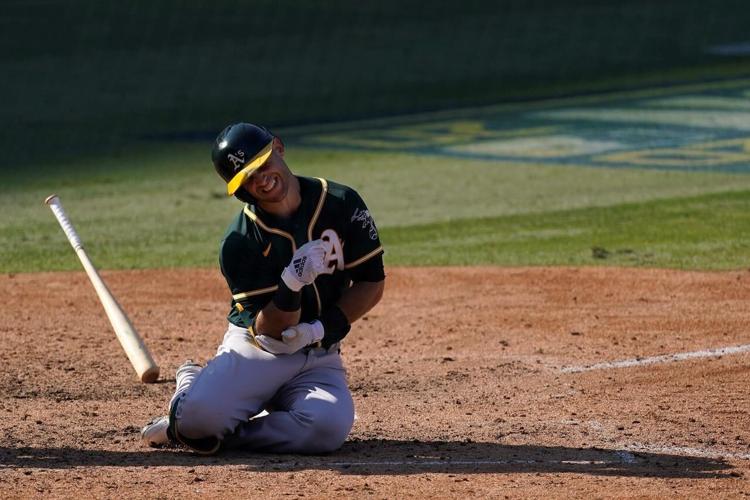 Pinder’s HR helps rally A’s past Astros 9-7, trail ALDS 2-1