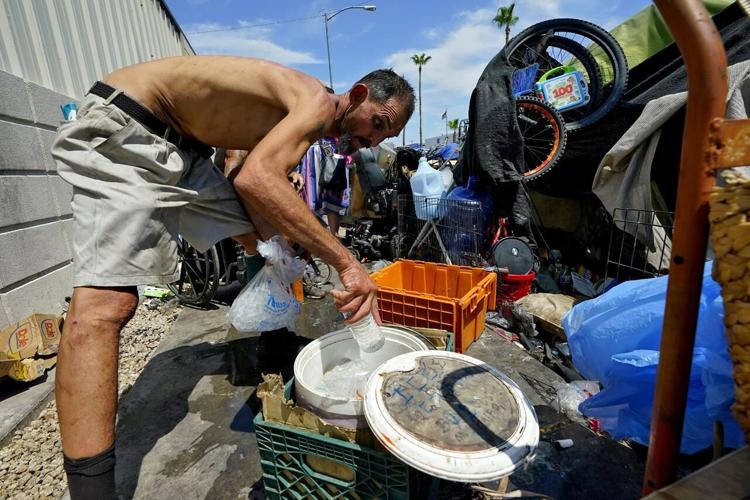 Homeless struggle to stay safe from record high temperatures in ...