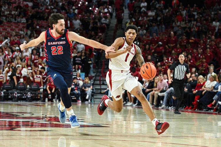 No. 21 Arkansas holds off Samford 79-75 behind freshman guards