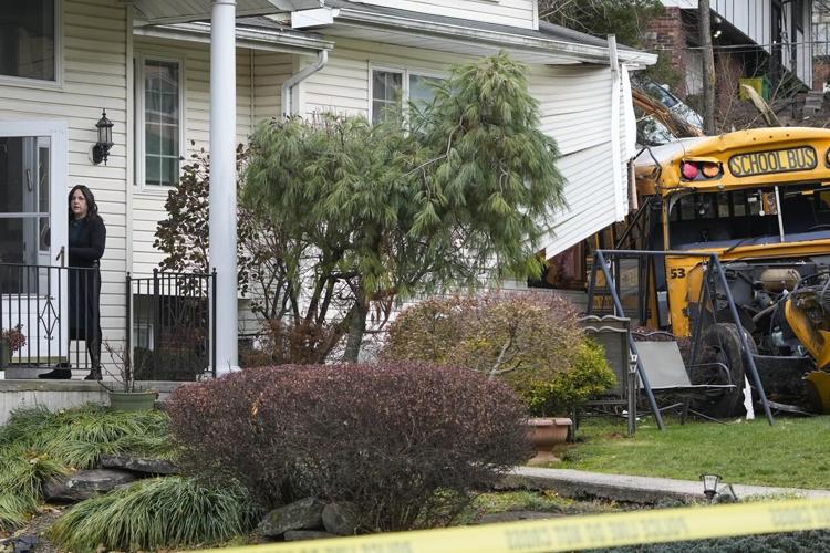 7 kids hurt when school bus crashes into house in NY suburb