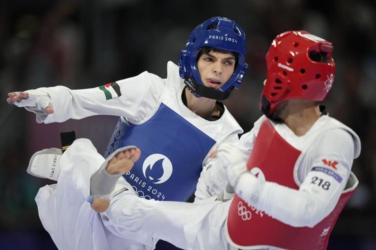 Refugee athlete's dream of a taekwondo medal is cut short at Paris Olympics
