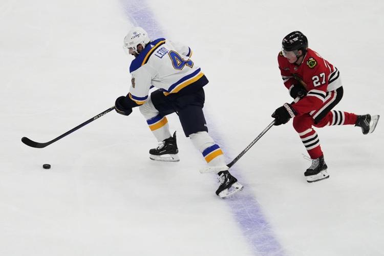 Jake Neighbours scores 2 goals as St. Louis Blues beat Chicago ...