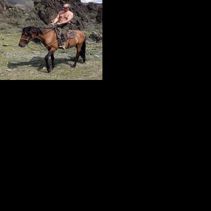 Russia's Putin flaunts pecs appeal