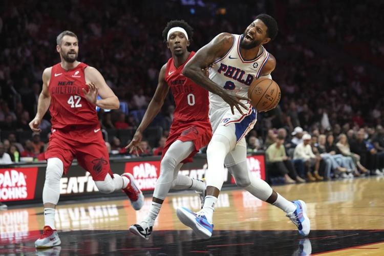 Heat shake off early deficit, roll past reeling 76ers 106-89