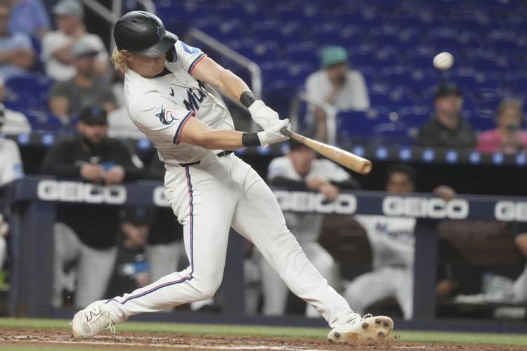 Josh Bell homers again as Nationals hold on to beat Marlins 7-5