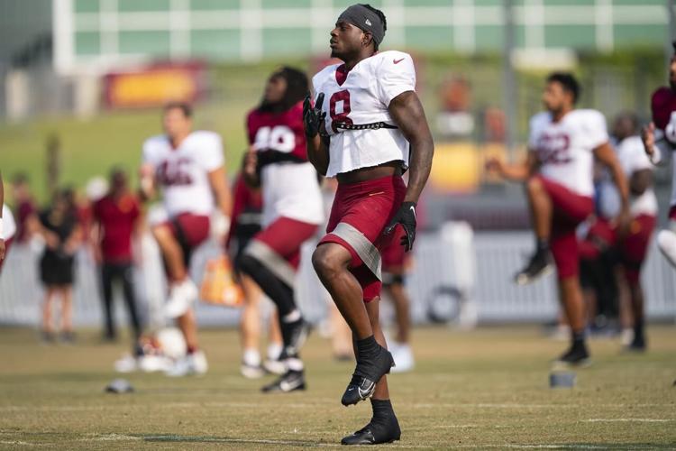 Commanders' Robinson feels 'night and day' a year since being shot in ...