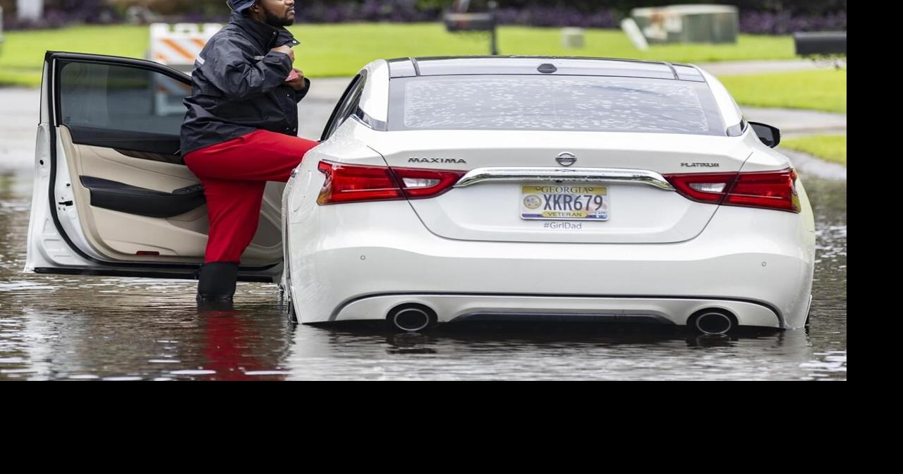 A deadly tornado, flooding rains and swollen rivers plague residents in ...