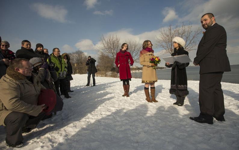 Warm hearts on a cold Lake Ontario shore as couple ties the knot