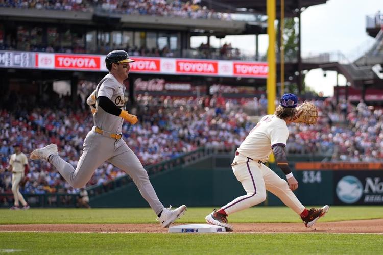 Harper, Turner homer and Phillies beat A's 11-5 to give Phillips the ...