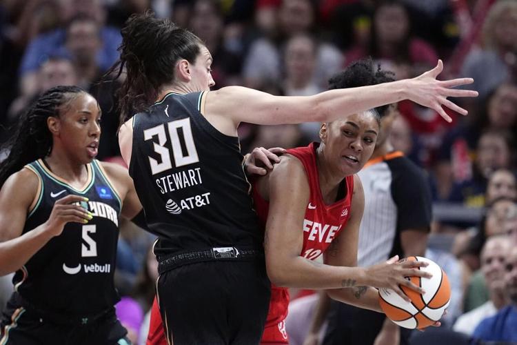 Caitlin Clark rallies Fever past Liberty 83-78 with first triple-double by WNBA rookie