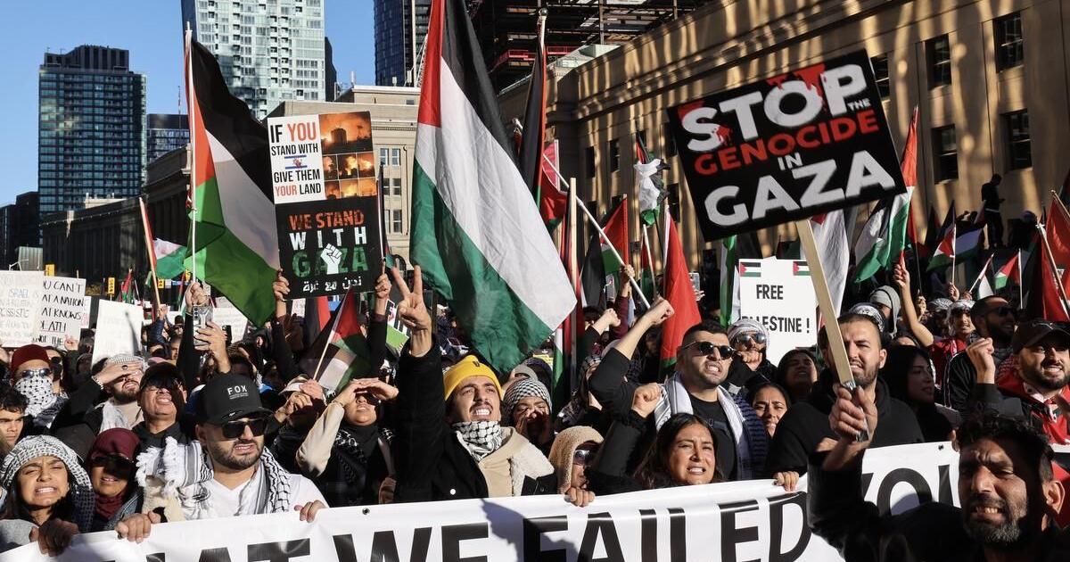 Thousands of protesters take over downtown Toronto streets