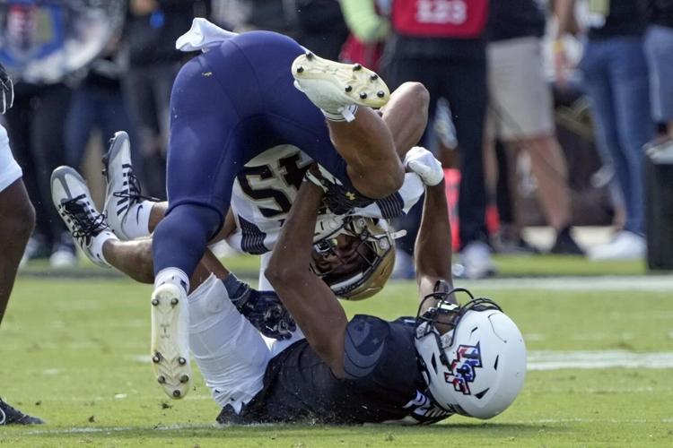 Fofana helps Navy top No. 17 UCF 17-14