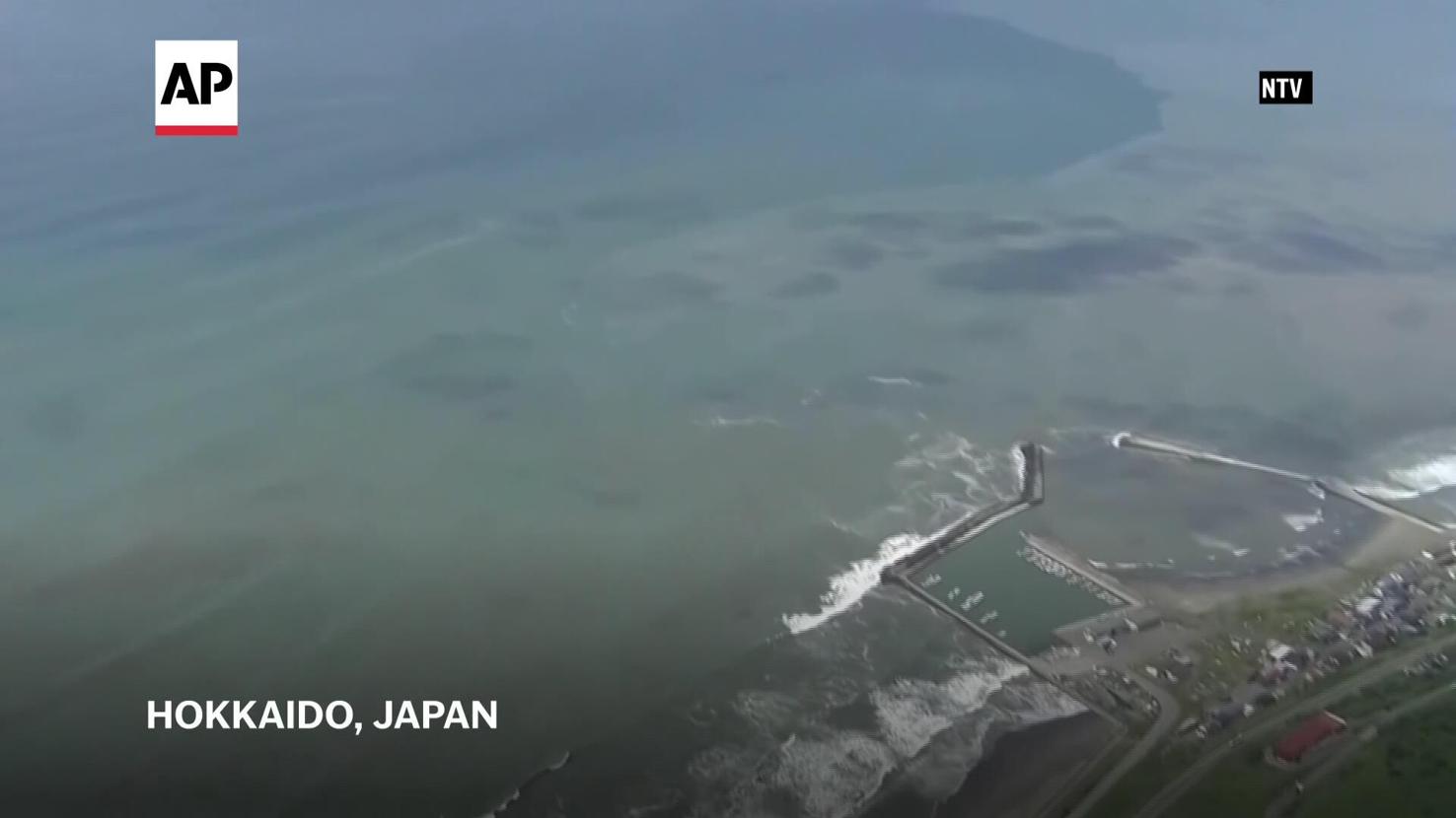 The Latest: Tsunami warnings lifted in most places