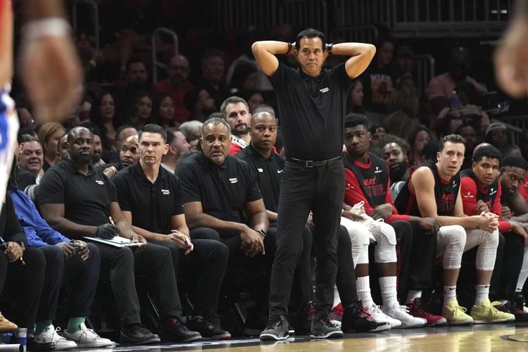 Heat shake off early deficit, roll past reeling 76ers 106-89