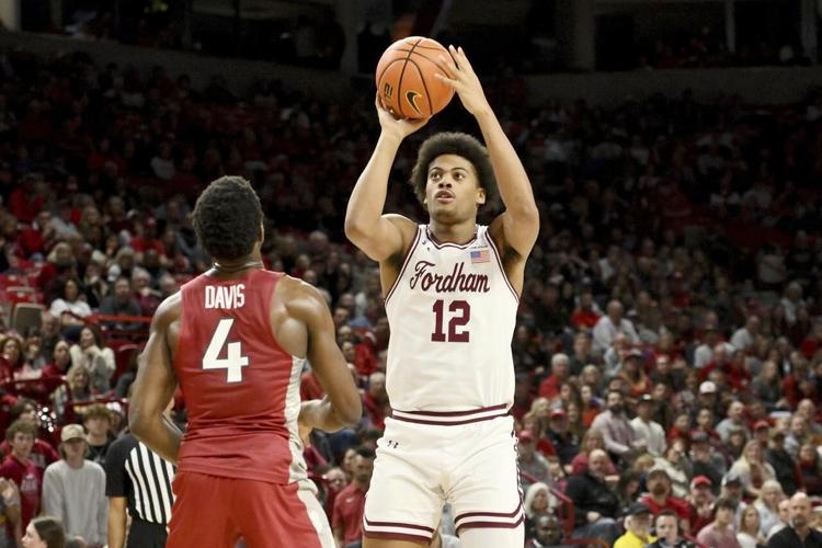Council, defense lift No. 10 Arkansas past Fordham, 74-48
