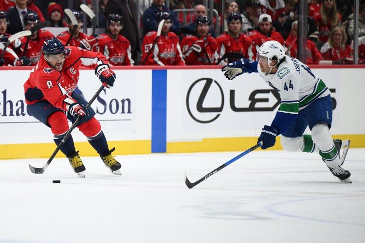 Canucks score 3 in the first, snap Washington's 4-game winning streak ...