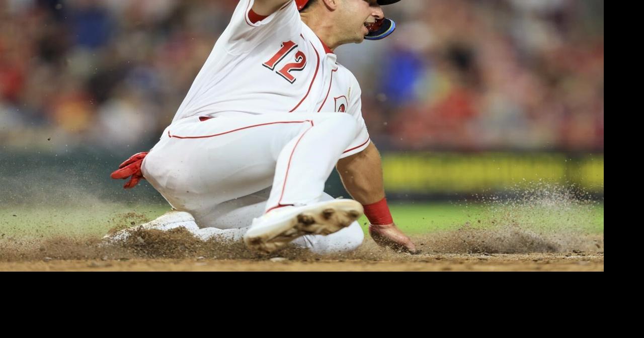 India chopper against 5-man infield lifts Reds over Rockies