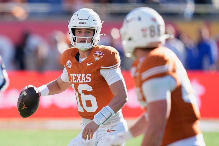 Arch Manning runs and passes Texas past Michigan in Citrus Bowl
