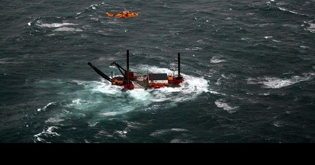 Fuel sheen where barge sank off Nova Scotia