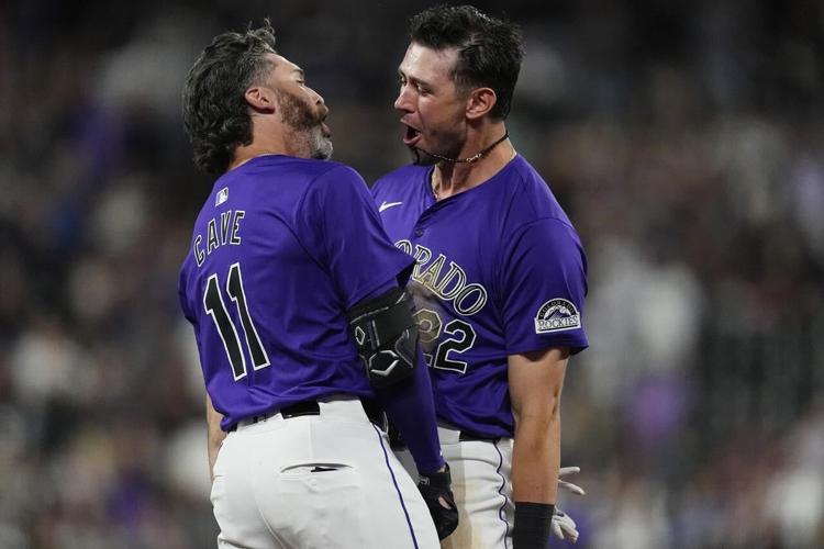 Jake Cave hits an RBI single in the 10th inning to lift the Rockies ...