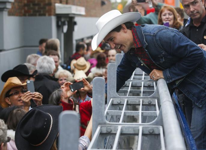 Trudeau dons cowboy hat, reassures Albertans at Calgary Stampede