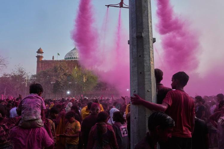 Photos of revelers celebrating Holi, the Hindu festival of colors, in ...