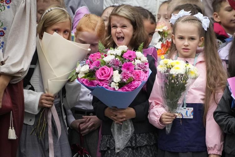 Russian students are returning to school, where they face new lessons to boost their patriotism
