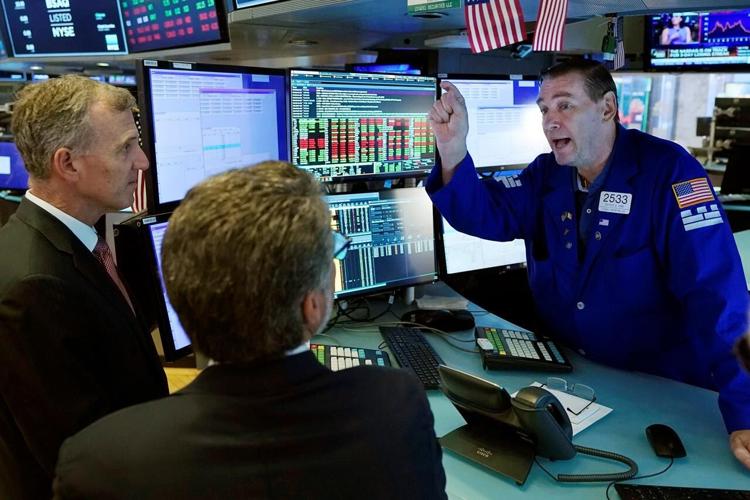 Stocks move lower as Wall Street winds down quiet week