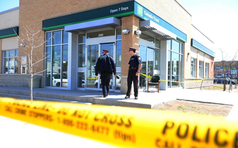 Two shot by Toronto bank robbers after customer challenges gunmen