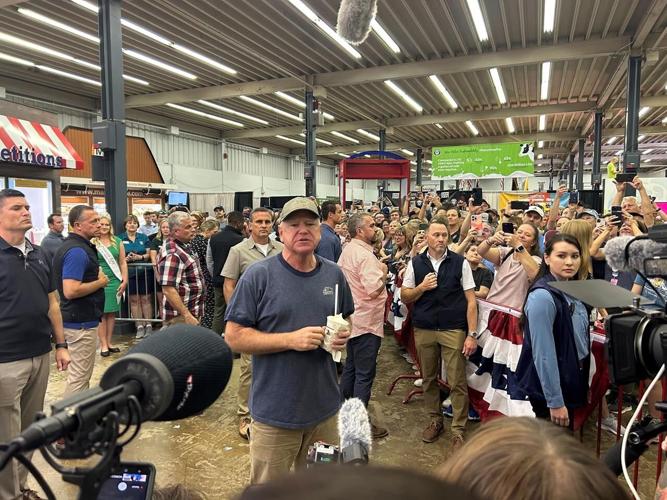 It's a pork chop on a stick and a vanilla shake for Tim Walz at the ...