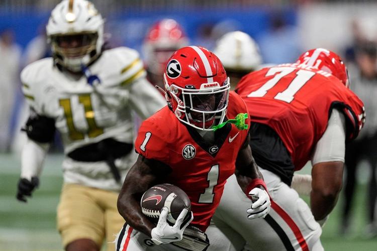No. 4 Georgia holds off No. 23 Georgia Tech 16-9 for 8th straight win ...