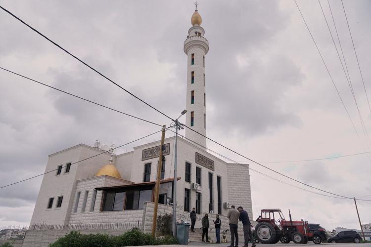 Israeli settlers torch and deface a West Bank mosque during Ramadan