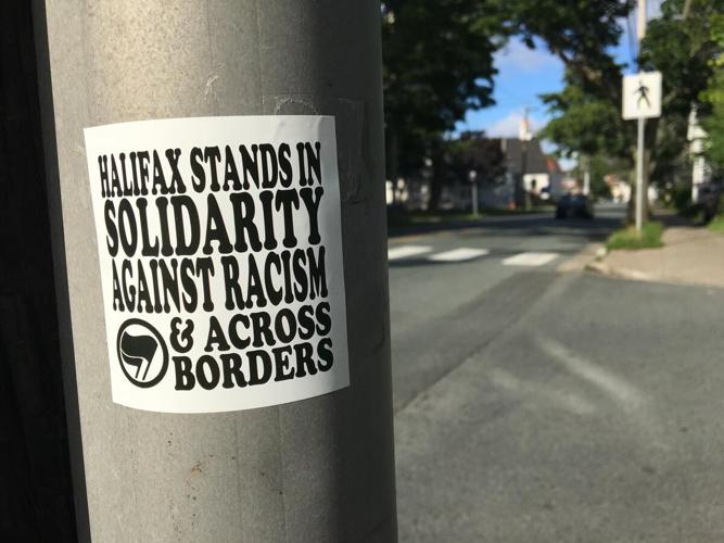 Halifax group combating hate with pro-immigration, anti-racist sticker ...
