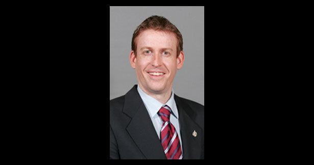 Harper mourns former MP's suicide