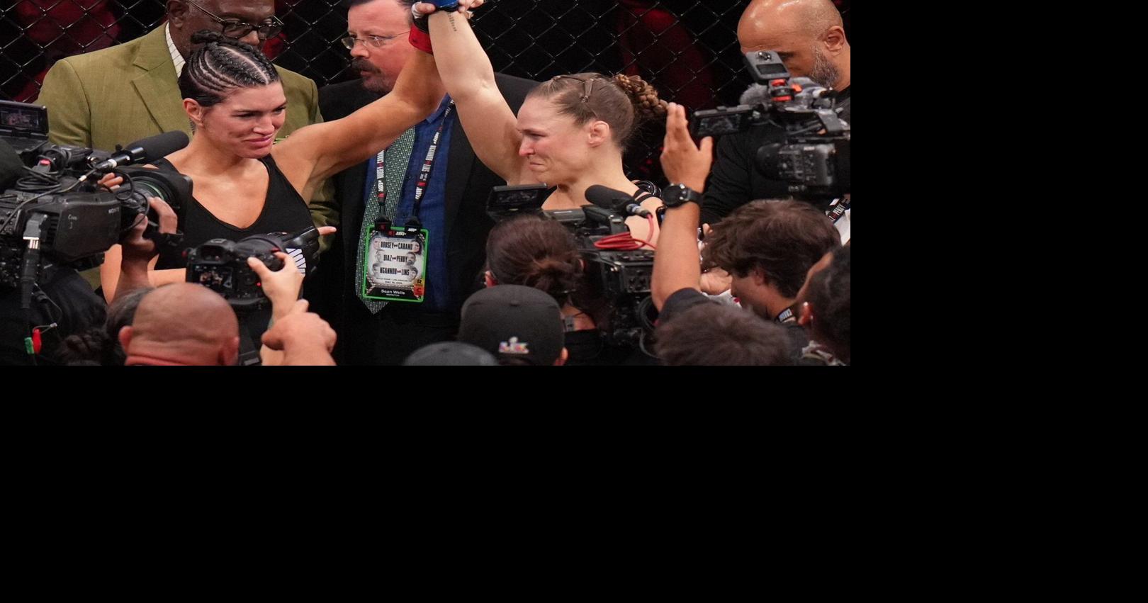 Ronda Rousey stops Gina Carano with an armbar 17 seconds into their ...