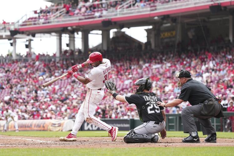Reds hit 3 home runs, Martinez throws 7 shutout innings to snap 3-game ...