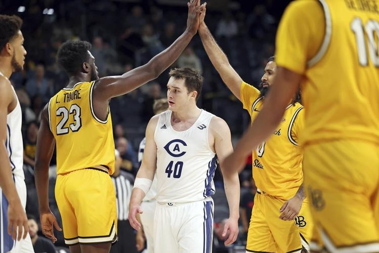 Long Beach State wins Big West title, takes coach Dan Monson dancin' in ...