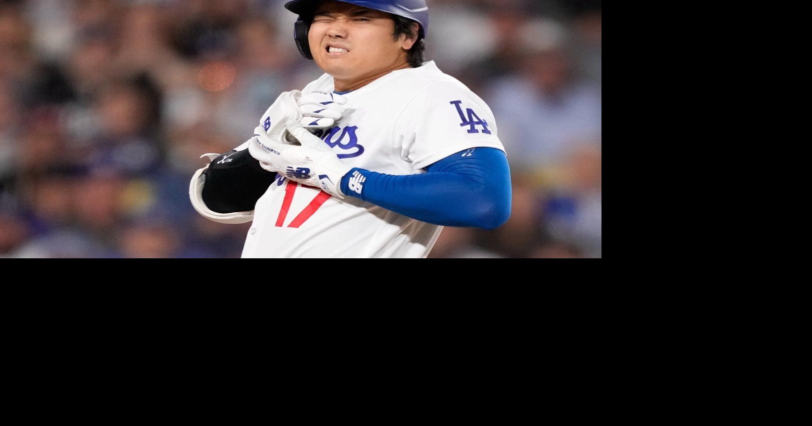Dodgers' Shohei Ohtani hit on the hand by a pitch, exits game against ...