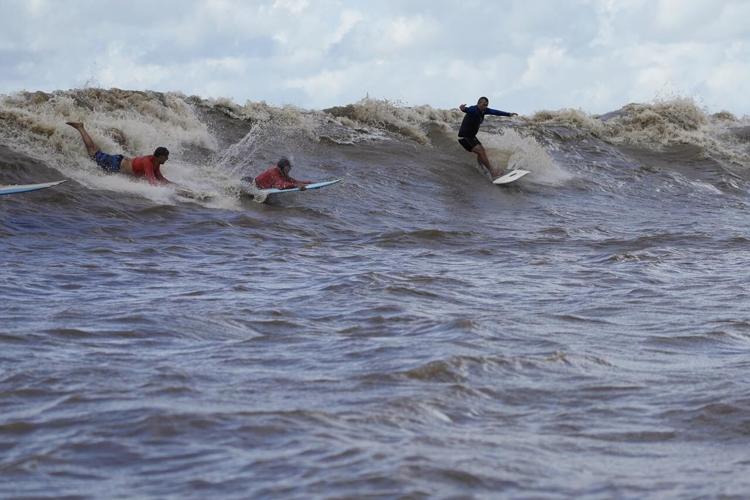Surfers at Amazon’s mouth ride some of world’s longest-lasting waves