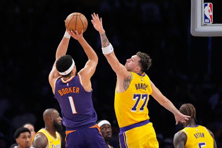 Suns snap Lakers' 7-game winning streak with 125-108 victory despite ...