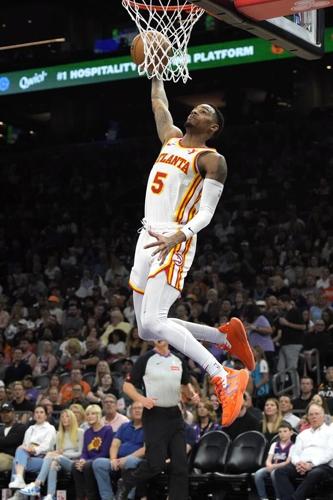 Devin Booker scores 30 points, Suns get hot from 3-point range to beat Hawks 128-115