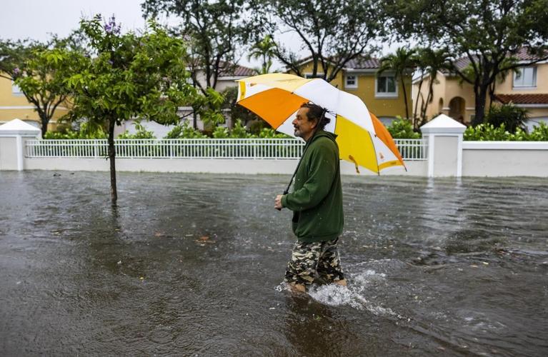 Tropical rainstorms in South Florida lead to flight delays and streets ...