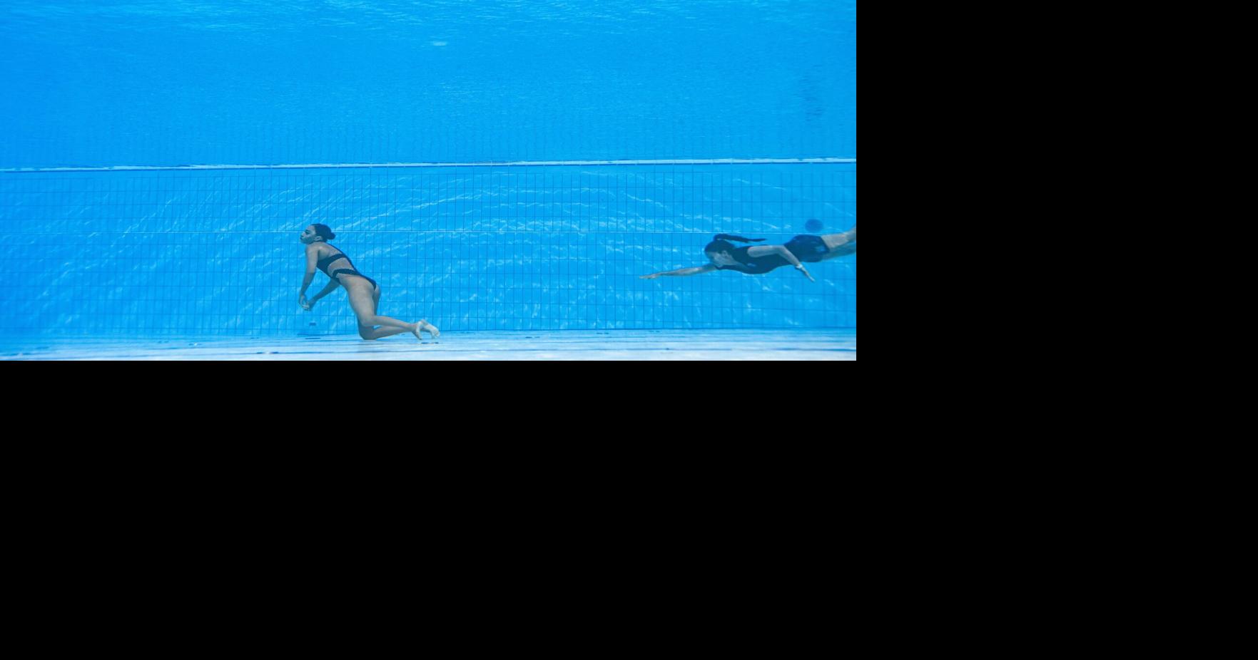 U.S. coach makes dramatic rescue of artistic swimmer at worlds