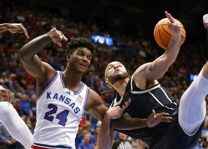 Mayo scores 19 as No. 1 Kansas beats Howard 87-57 in season-opener