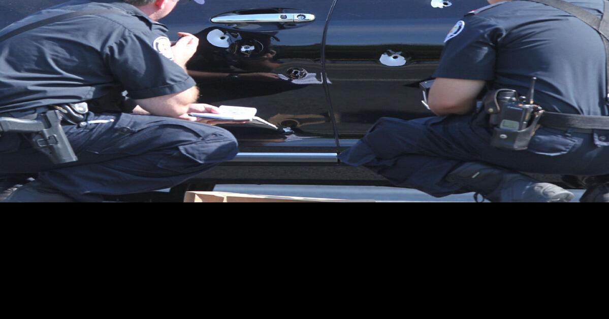 Driver escapes with nicked ear in bullet-riddled car