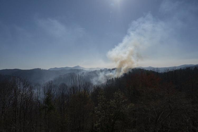 Firefighters make progress on containing some Carolina wildfires, but others grow