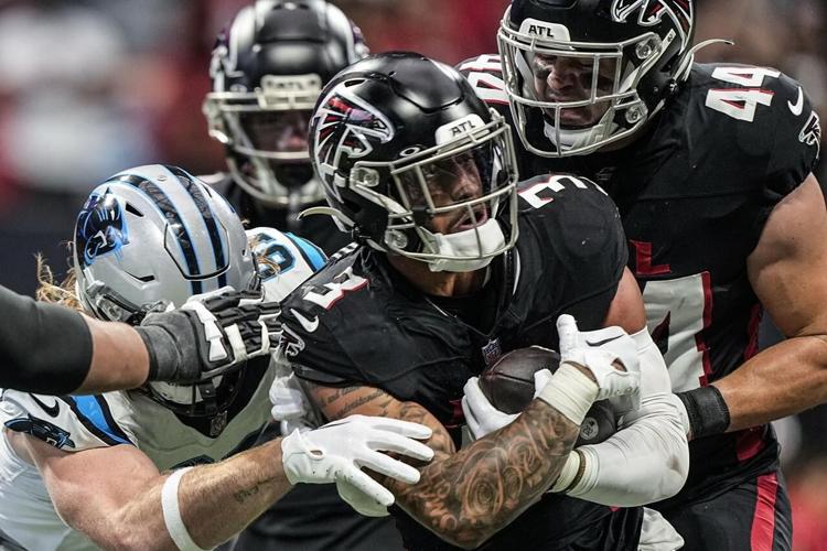 Bates flourishes with 2 picks and a forced fumble in debut for new-look ...