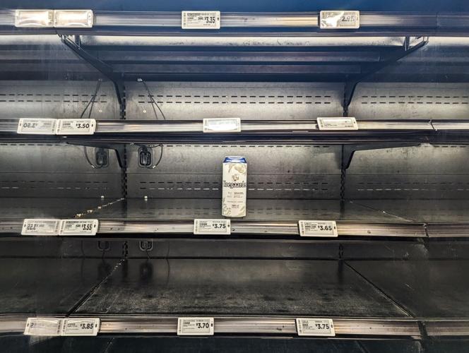 Some grocery booze shelves almost empty amid ‘panic buying’