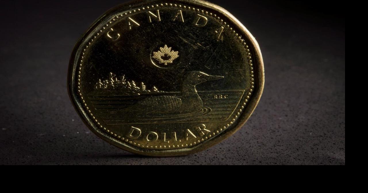 S&P/TSX composite drops, loonie gains in reaction to hawkish Bank of ...